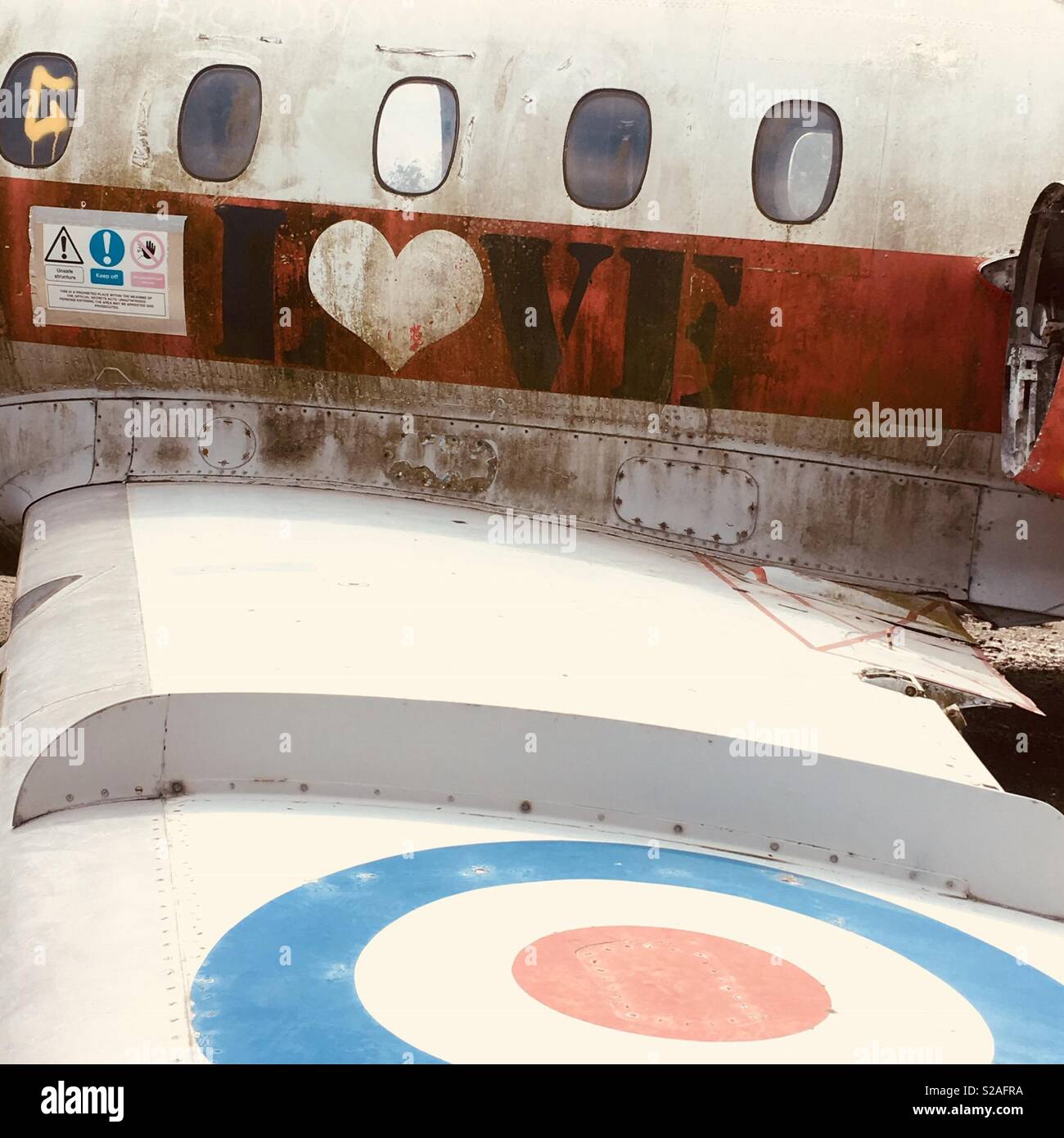 Abandoned aircraft with graffiti. Pop art style Stock Photo - Alamy