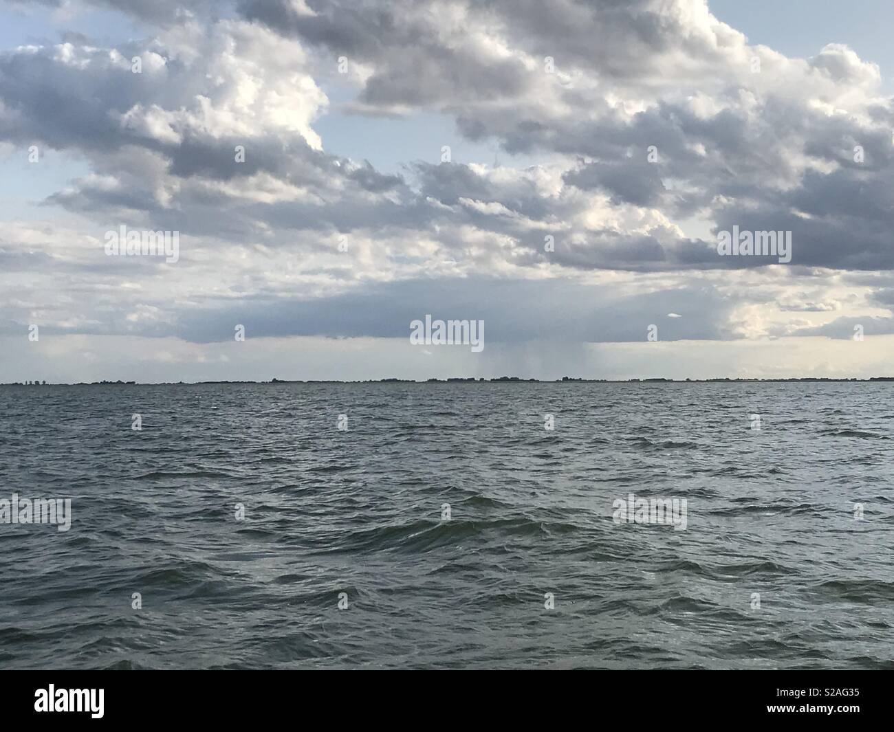 Rain clouds in the distance hi-res stock photography and images - Alamy