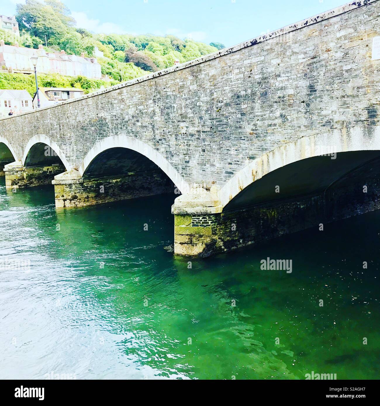Ancient bridge Looe fishing village south West Cornwall Stock Photo - Alamy