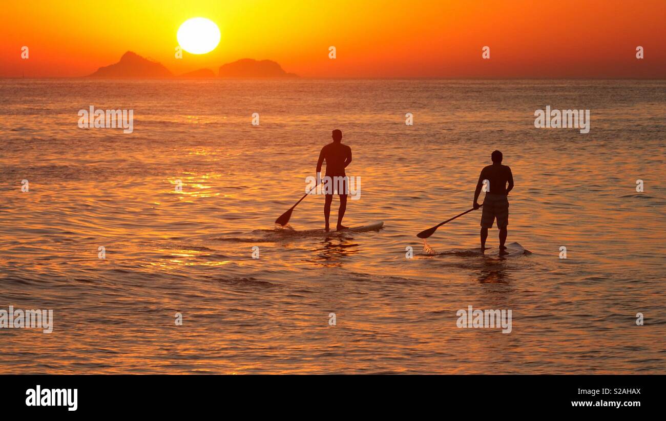 Sunset Men in Ipanema beach,Brazil Stock Photo - Alamy