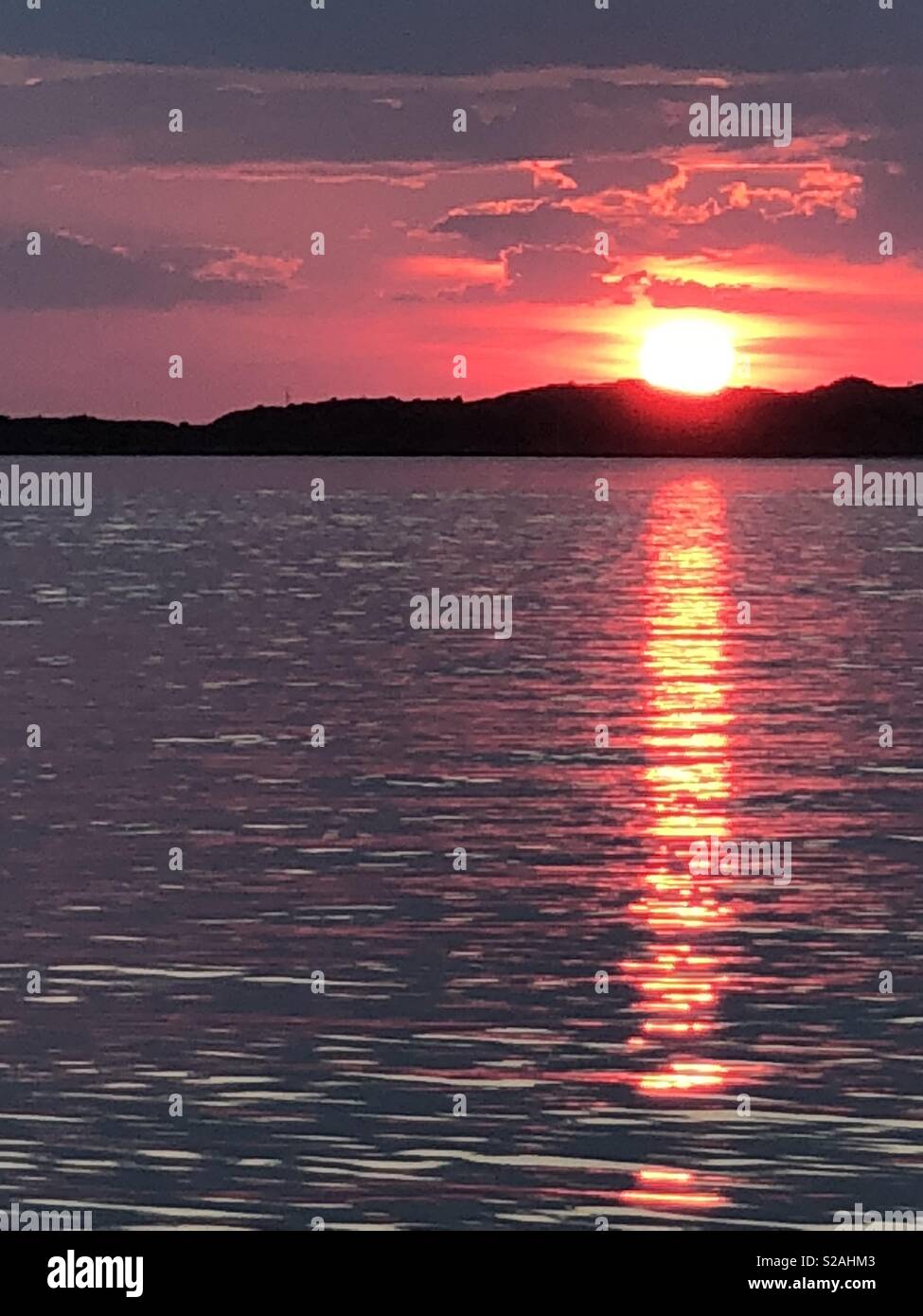Red sunset by the sea Stock Photo - Alamy