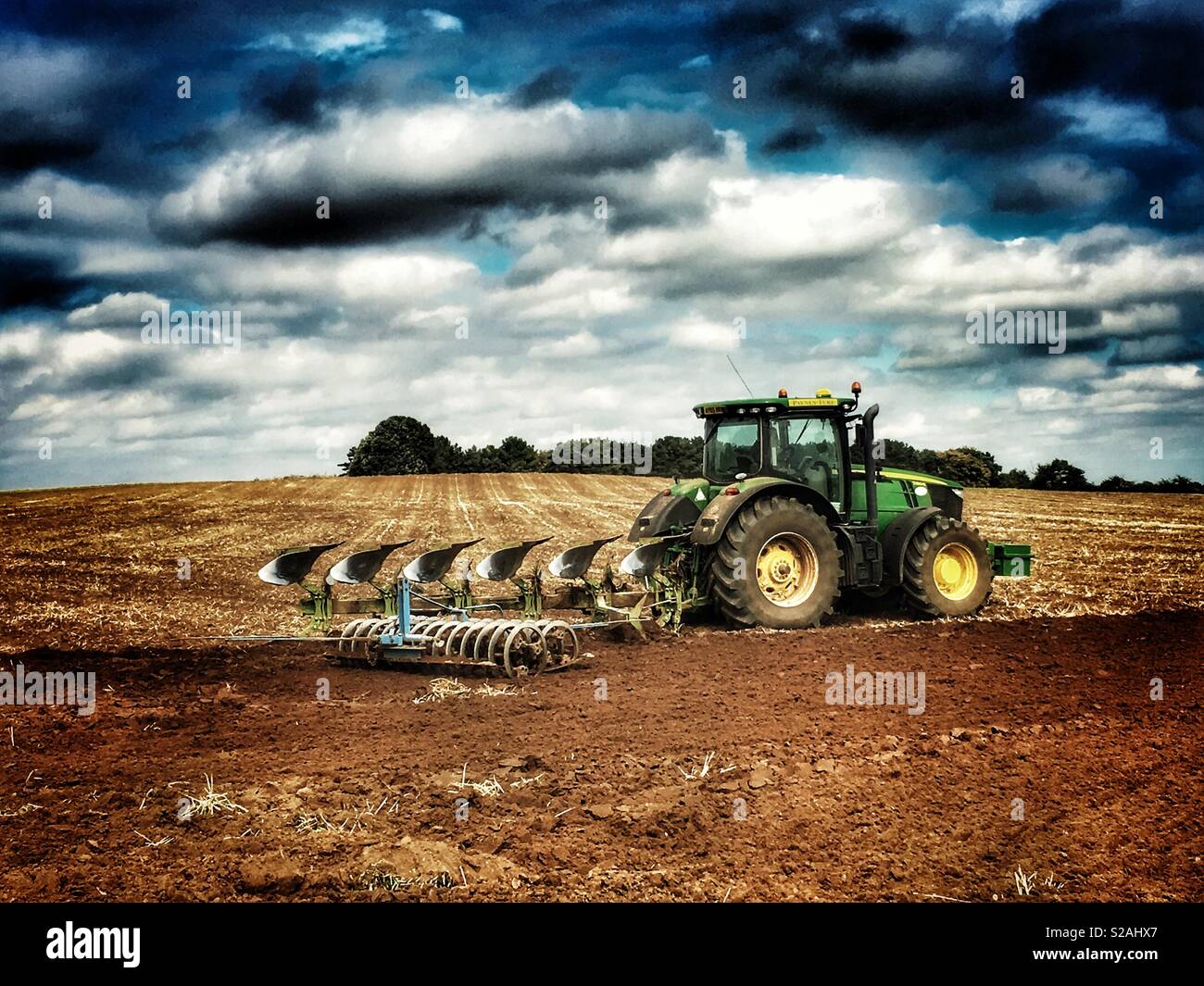 Field being ploughed Stock Photo - Alamy