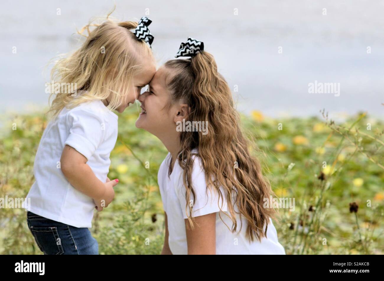 Love between sisters Stock Photo - Alamy