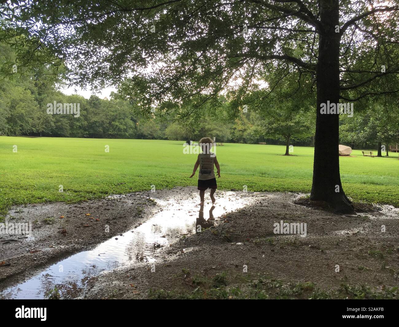 Boy in the rain hi-res stock photography and images - Alamy