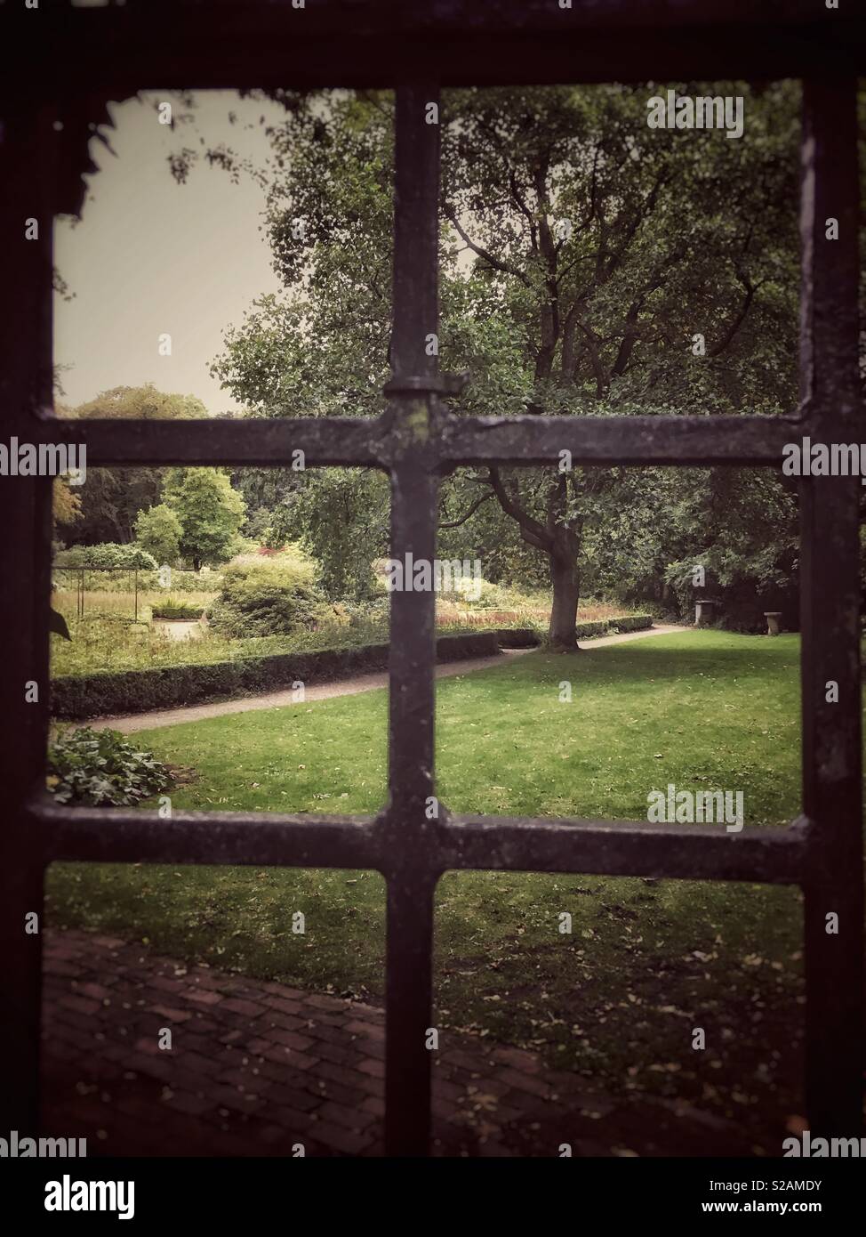 Look through the gate Stock Photo - Alamy