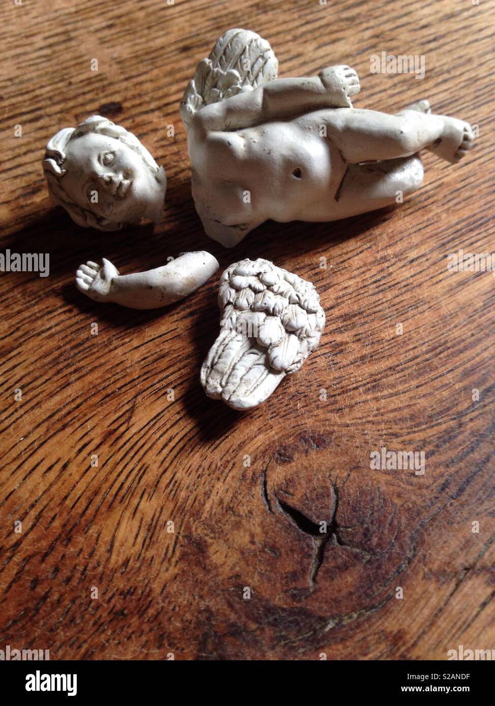 A Broken Cupid Stock Photo - Alamy