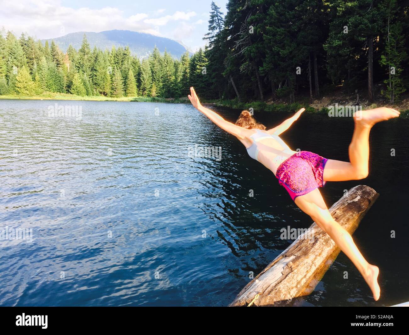 Jumping Into Lake Girl High Resolution Stock Photography and Images - Alamy