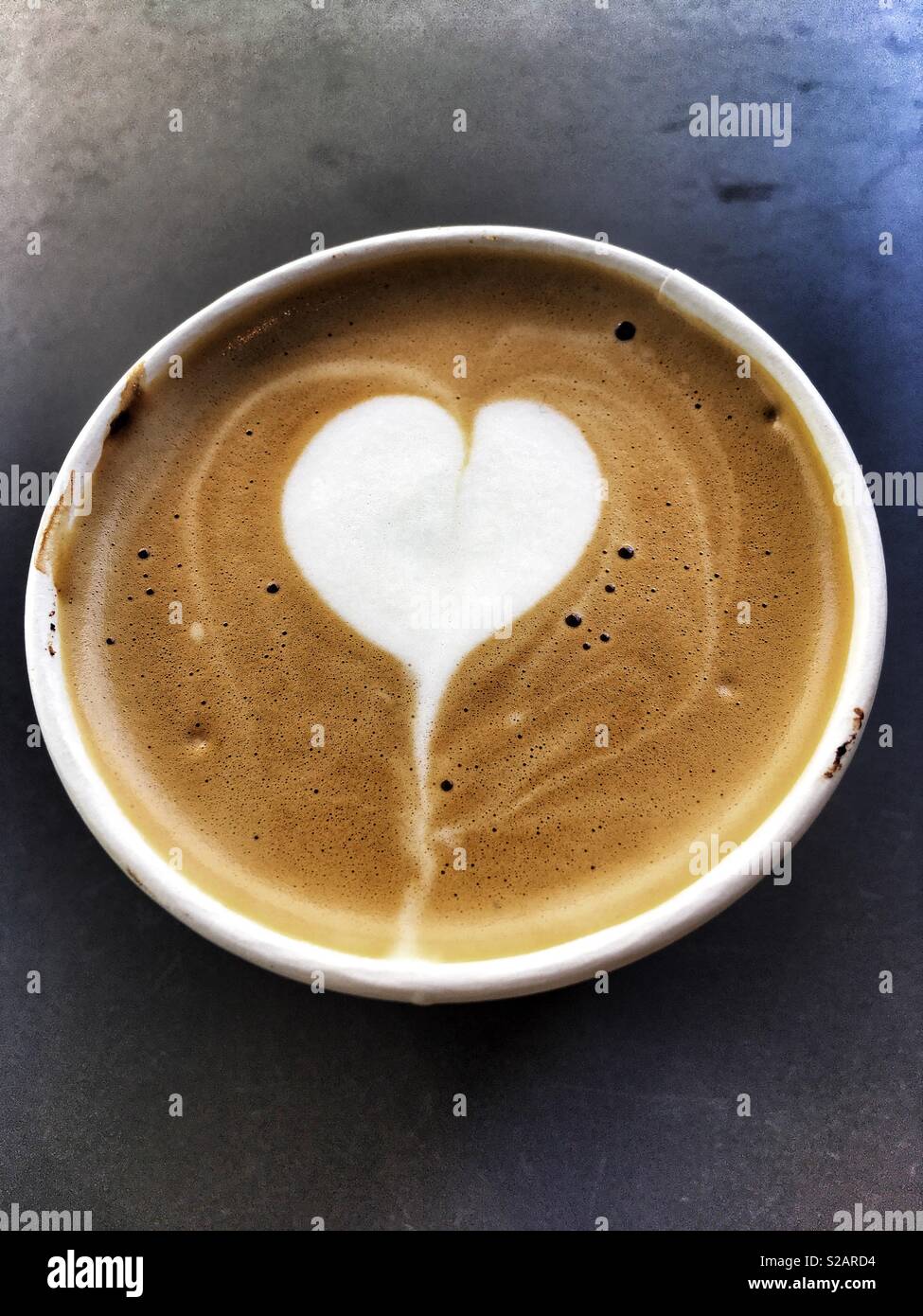 Heart shape in a latte coffee Stock Photo - Alamy