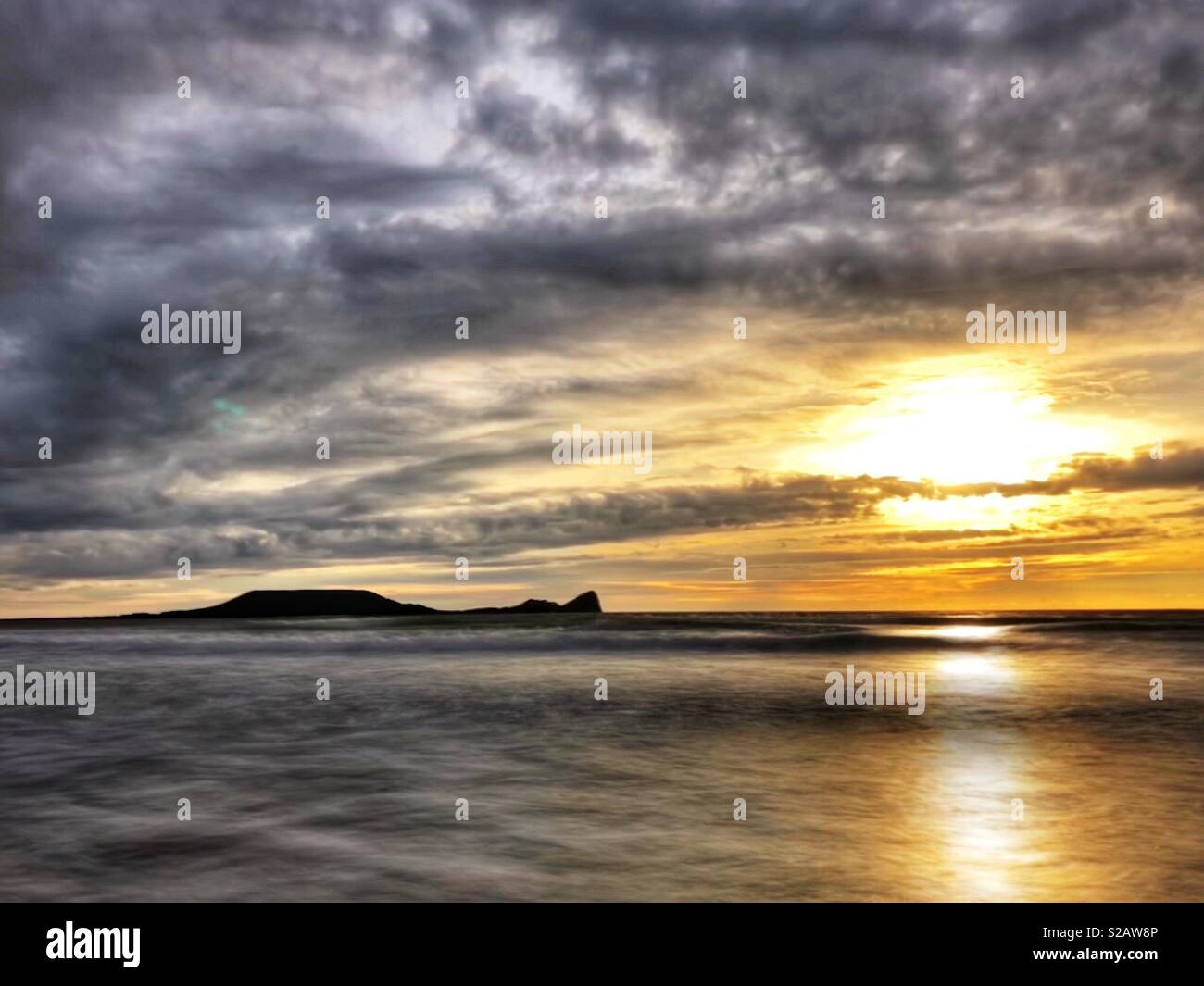 Worms Head at sunset, Rhossili beach, Gower, Wales, September Stock ...