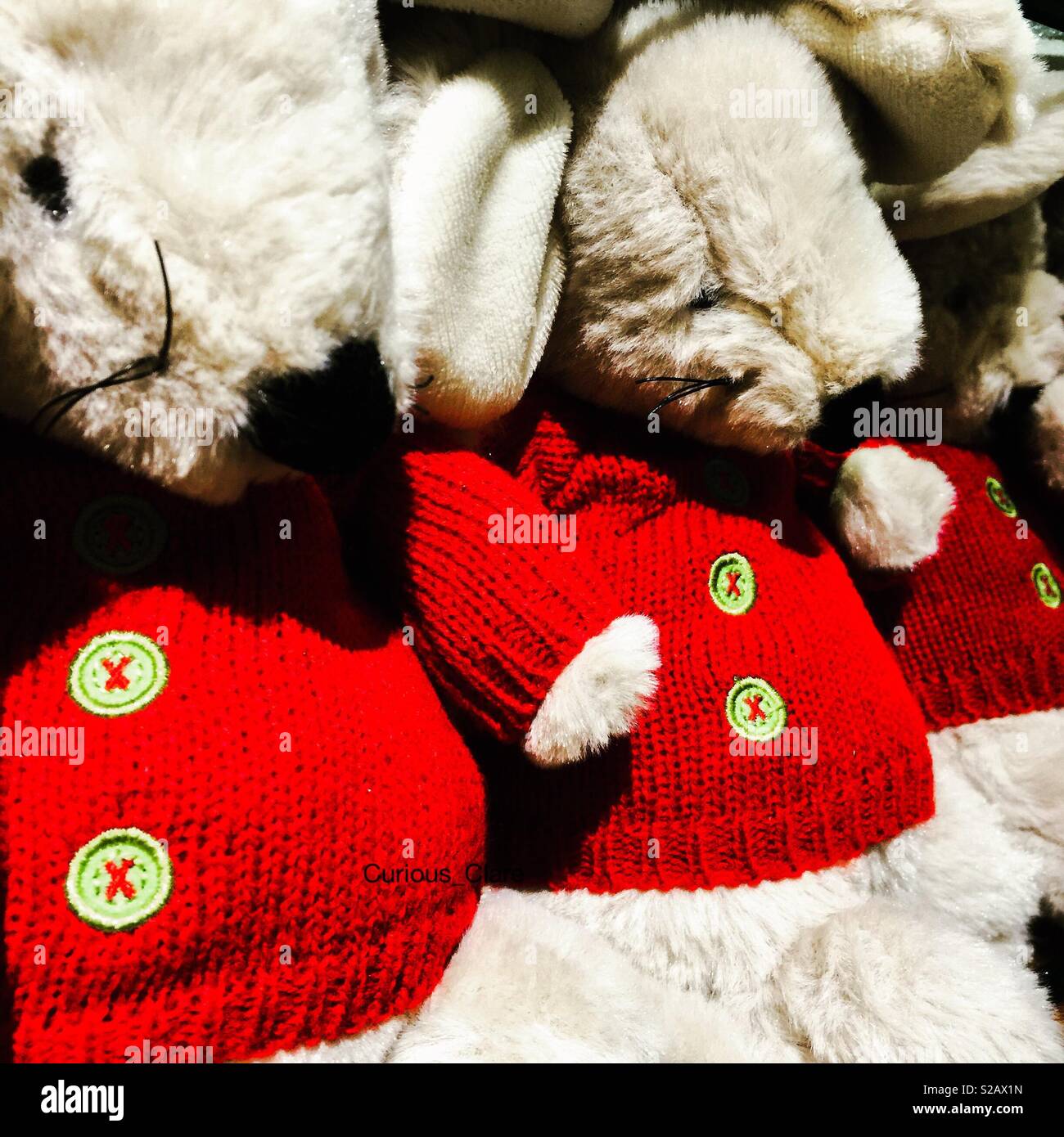 Mice soft toys in red jumpers Stock Photo - Alamy