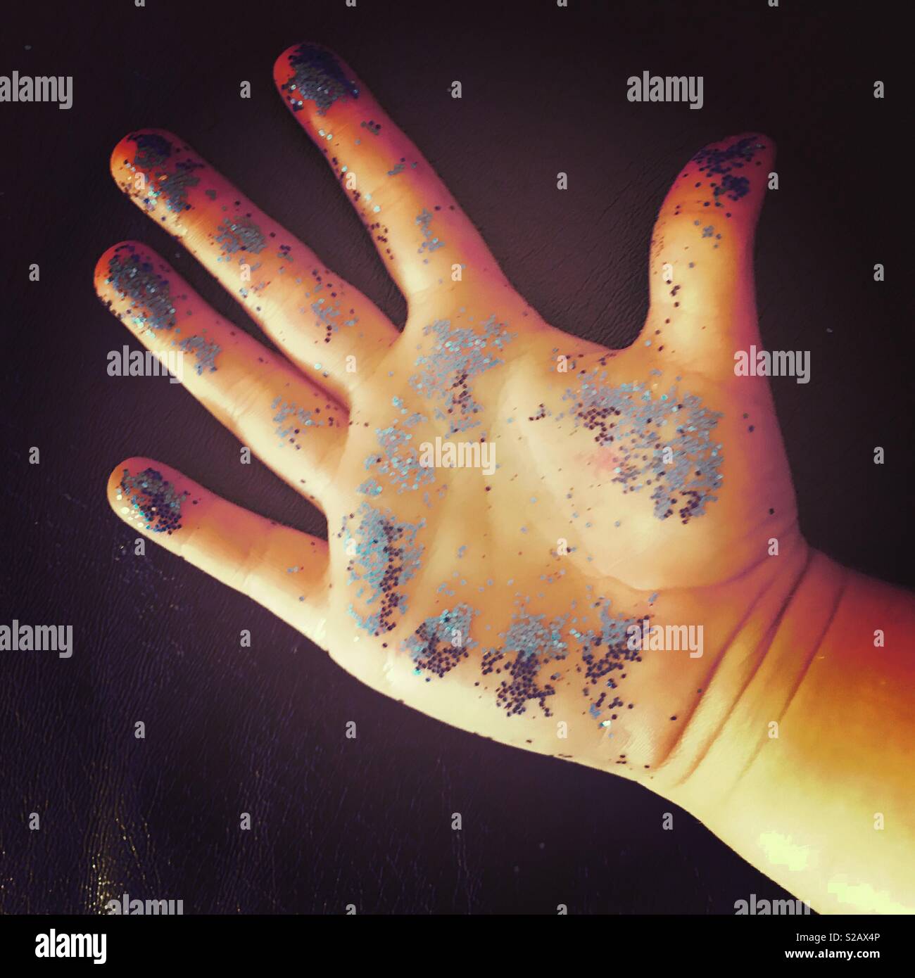 Kids hand covered in paint hi-res stock photography and images - Alamy