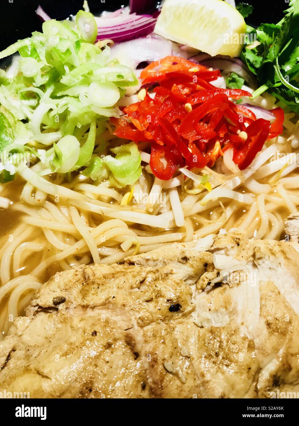 Wagamama chicken chilli ramen Stock Photo - Alamy