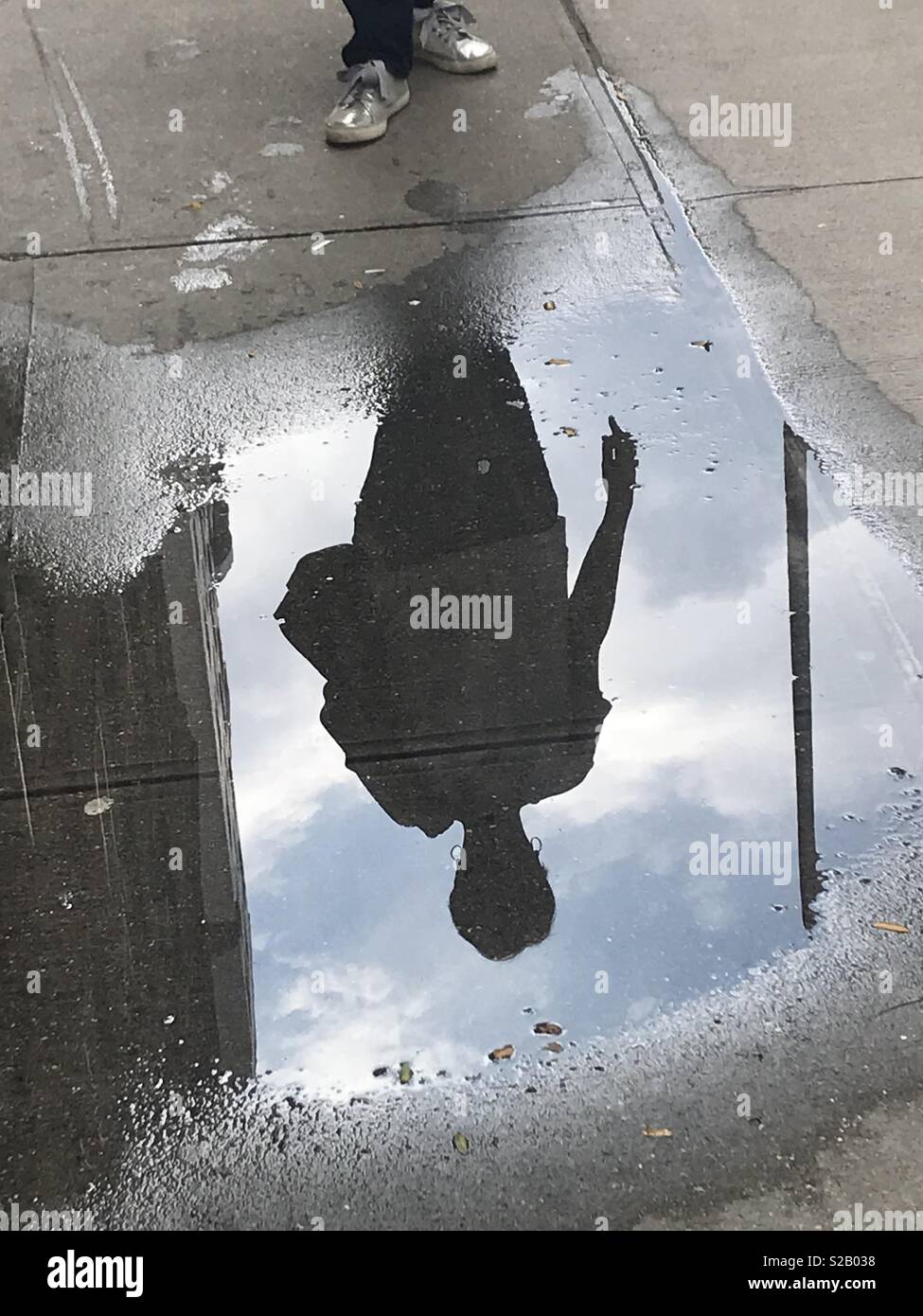 Rain puddle city hi-res stock photography and images - Alamy