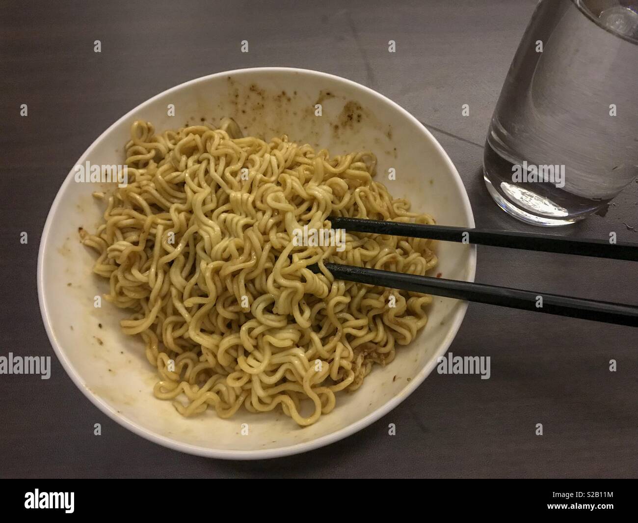 Noodles with water in glass Stock Photo - Alamy