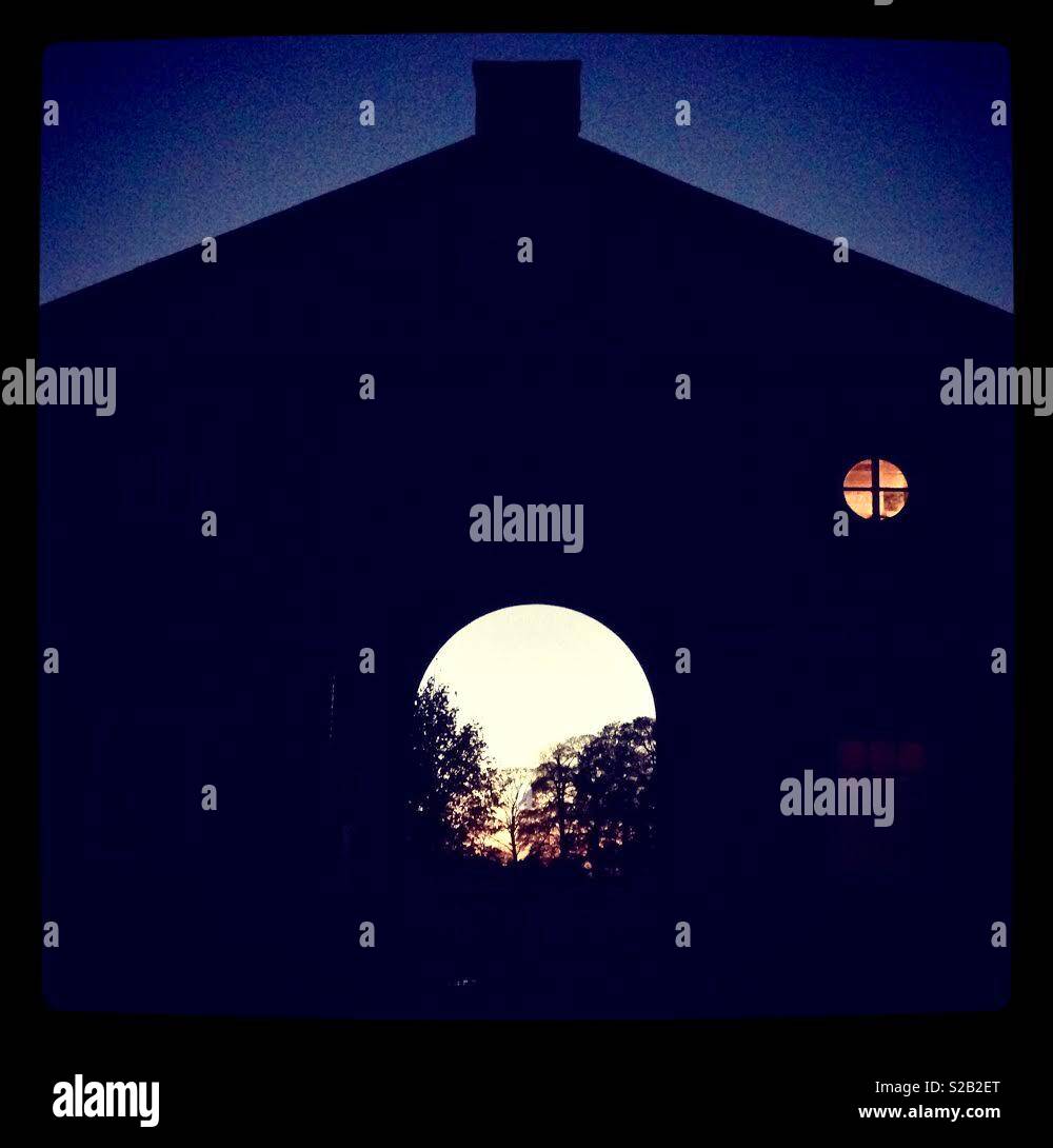 Light shining through window at night hi-res stock photography and ...