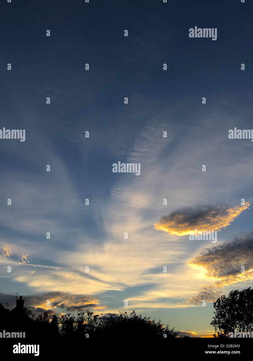 Blue sky with golden light hi-res stock photography and images - Alamy