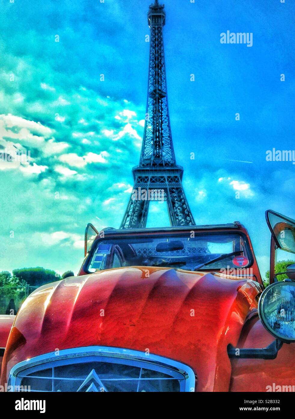 The Eiffel Tower and a red Citroen car in Paris, France Stock Photo - Alamy