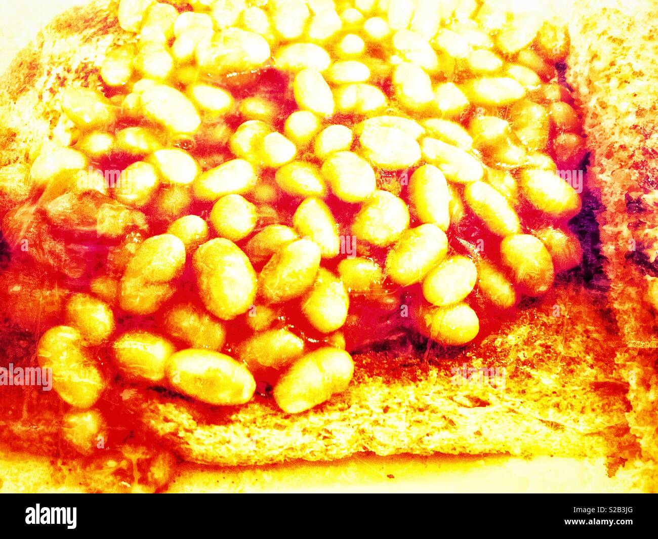 Beans on toast, grunge filter applied Stock Photo - Alamy