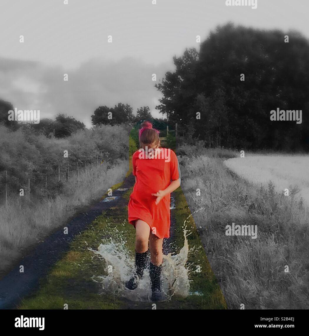 Puddle jumping hi-res stock photography and images - Alamy