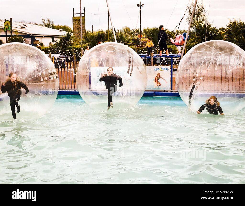 Water walking balls on a pool Stock Photo - Alamy