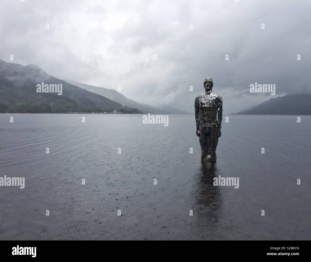 Mirror man statue in Loch Earn at St Fillans in Scotland during a ...