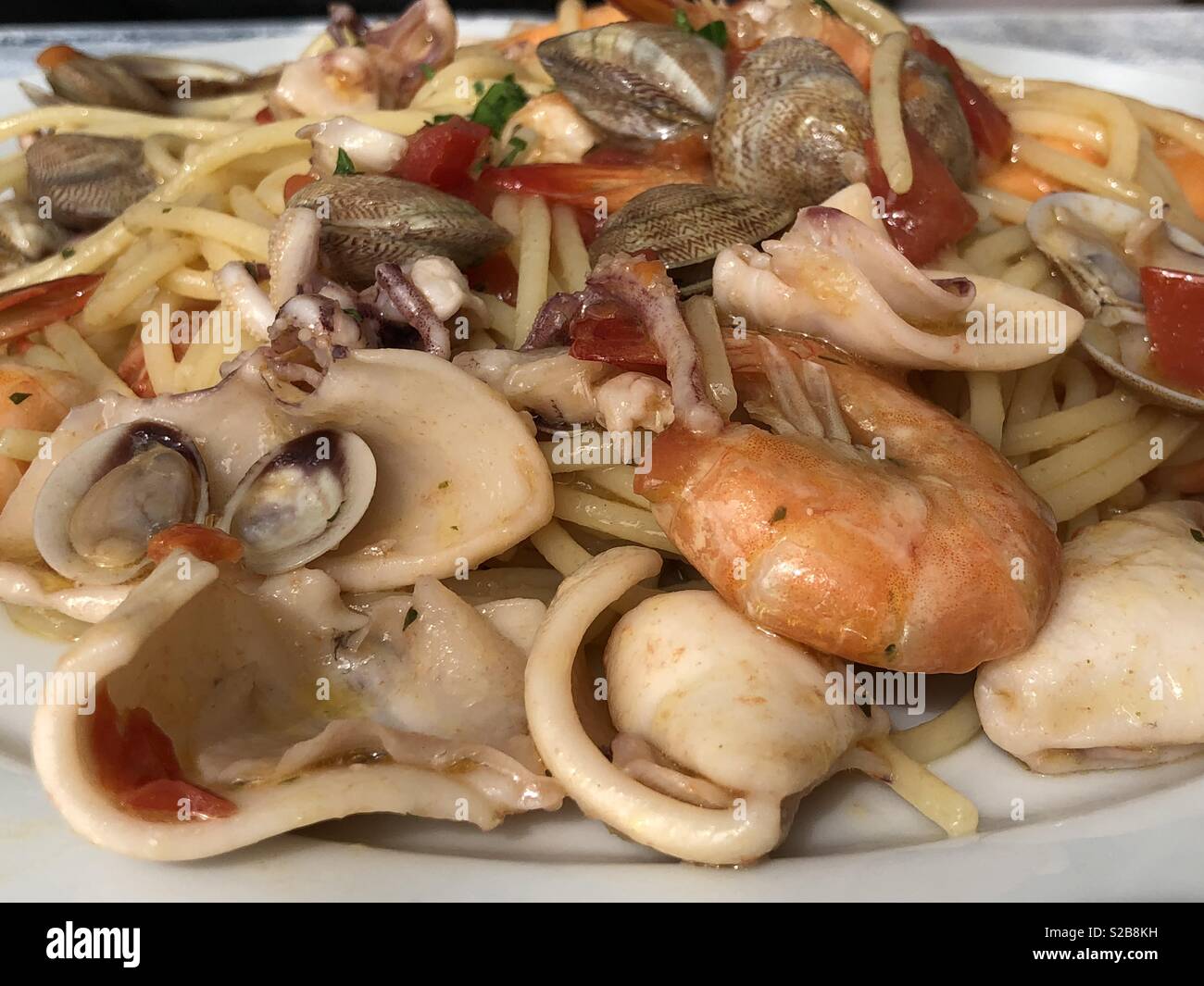 Shellfish pasta, italian spaghetti allo scoglio at the restaurant Stock ...