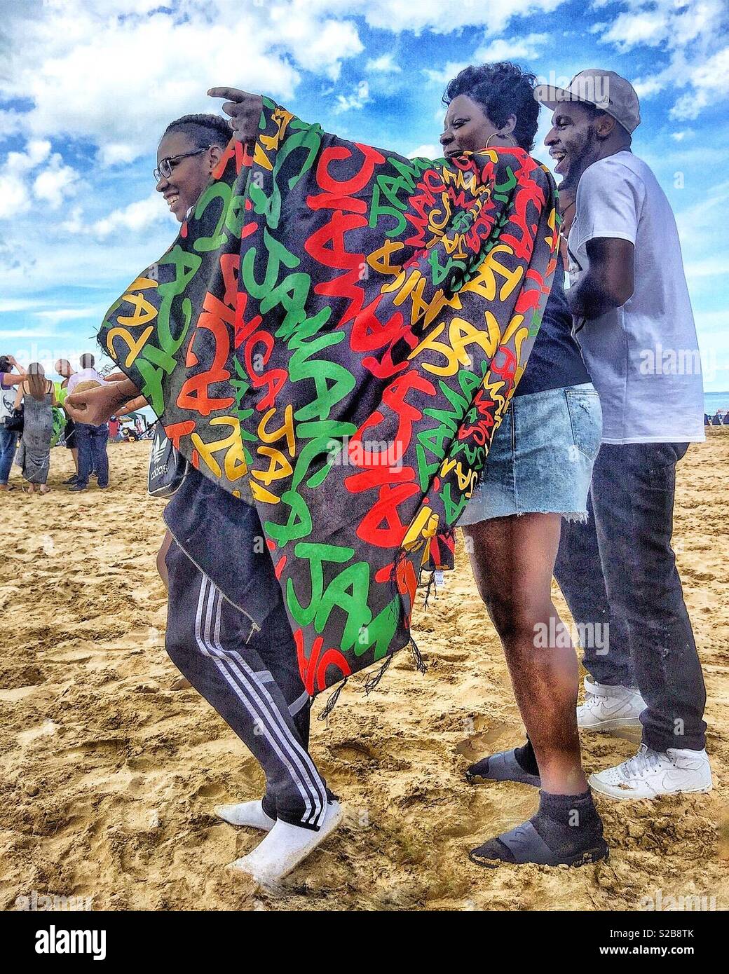 A Jamaican family having fun on Margate beach Stock Photo - Alamy