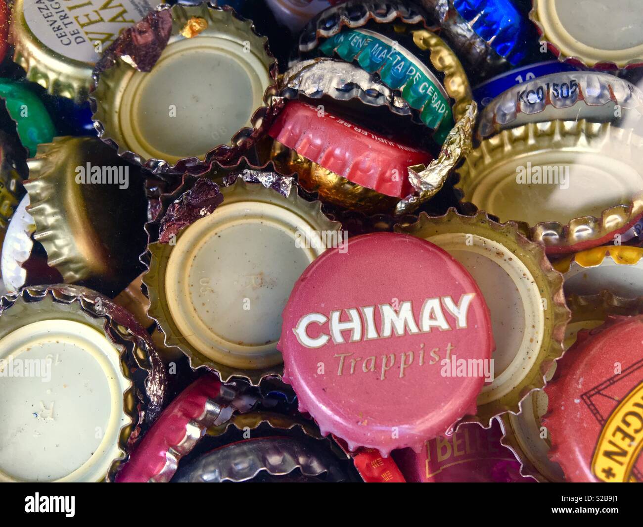 Stacks of bottle tops hi-res stock photography and images - Alamy