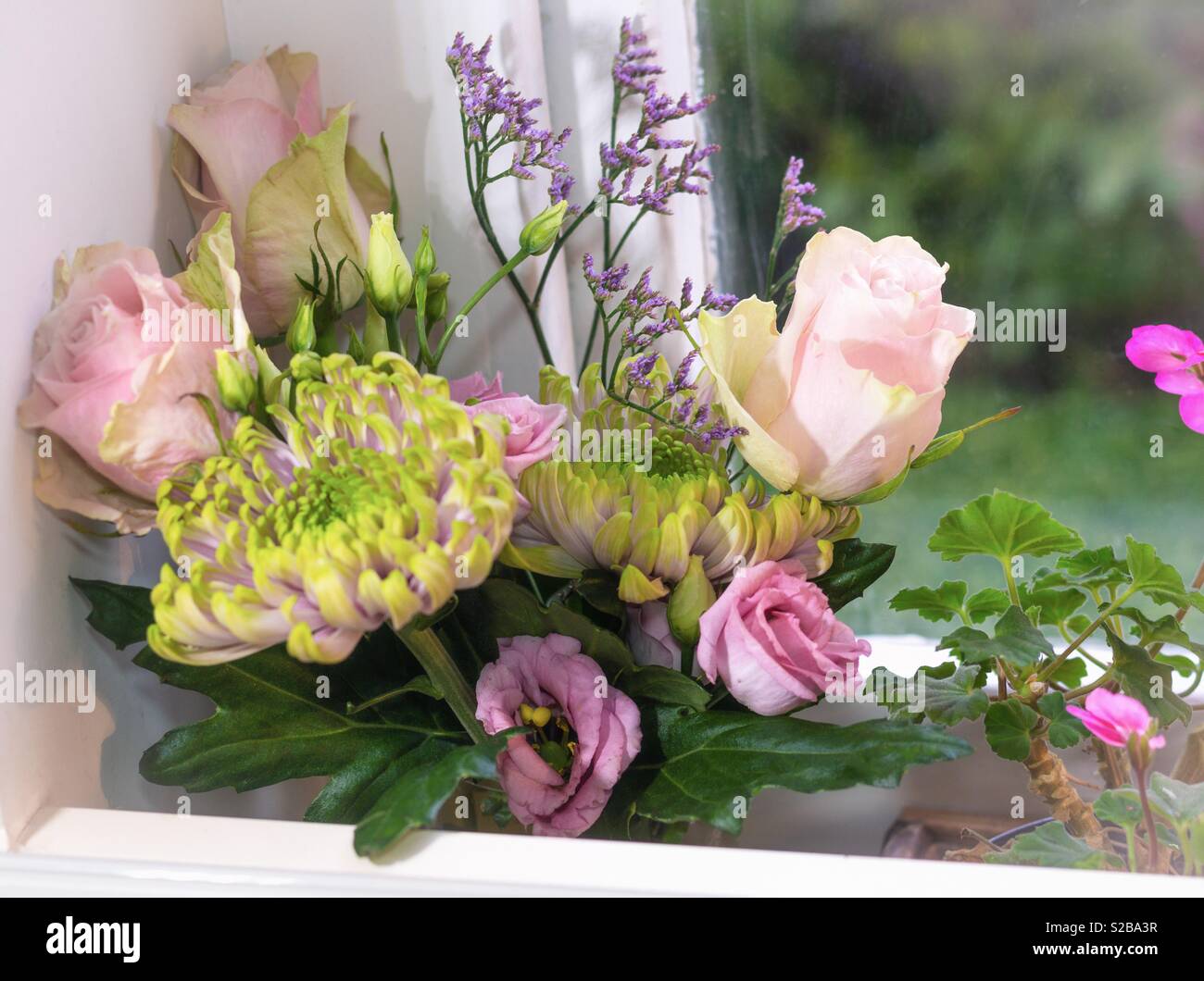 Flower arrangement on window ledge hi-res stock photography and images ...