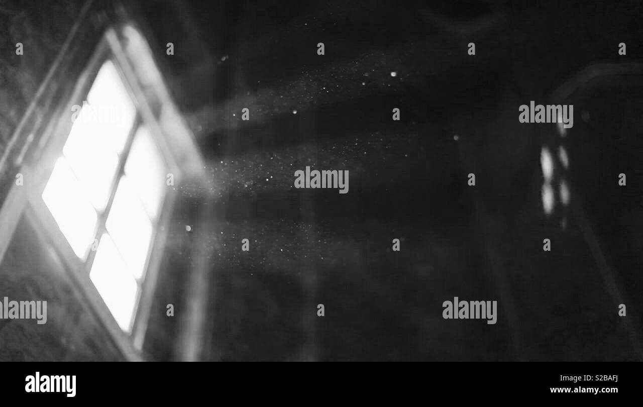 Dust light window Black and White Stock Photos & Images - Alamy