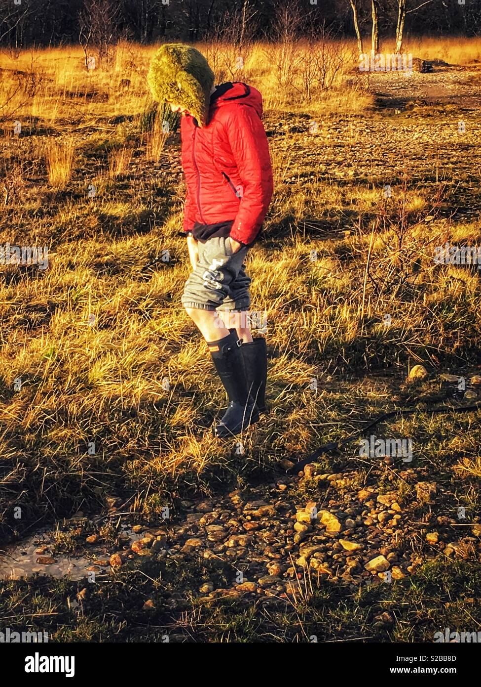 Boy in wellies hi-res stock photography and images - Alamy
