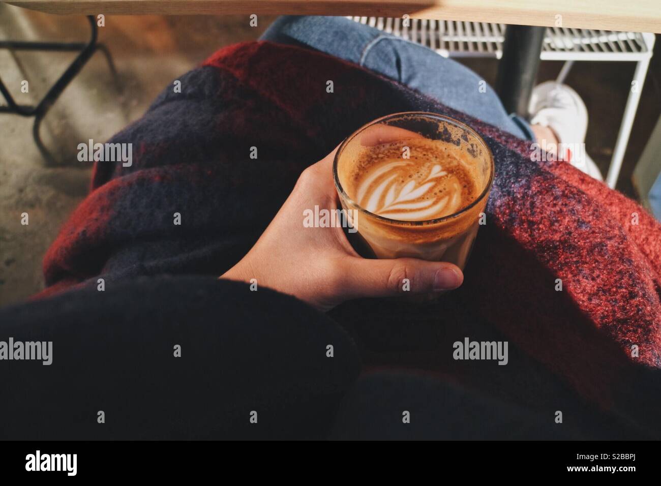 Coffee in hand Stock Photo - Alamy