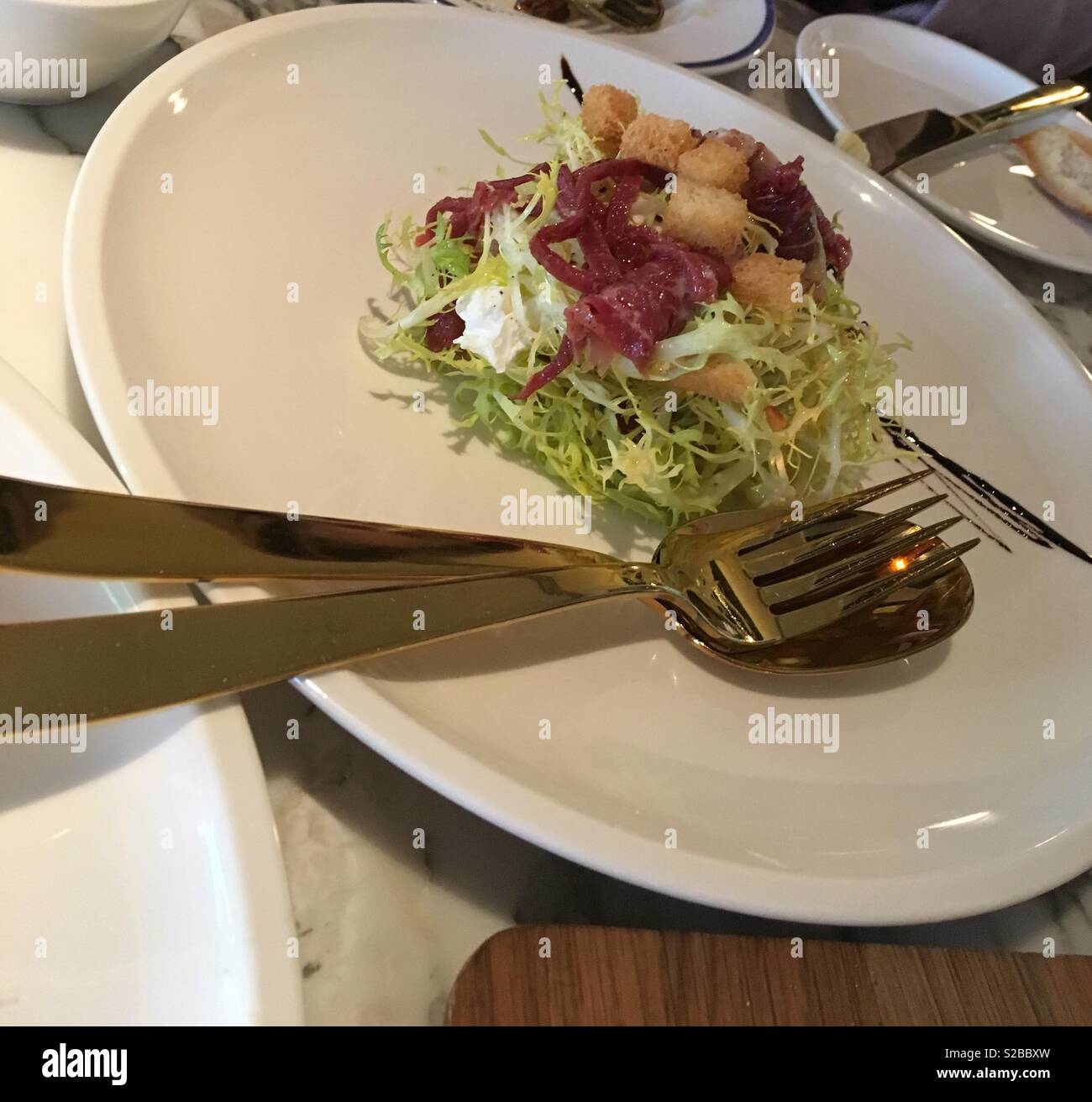 Salad, plates, fork & spoon, lunch Stock Photo - Alamy