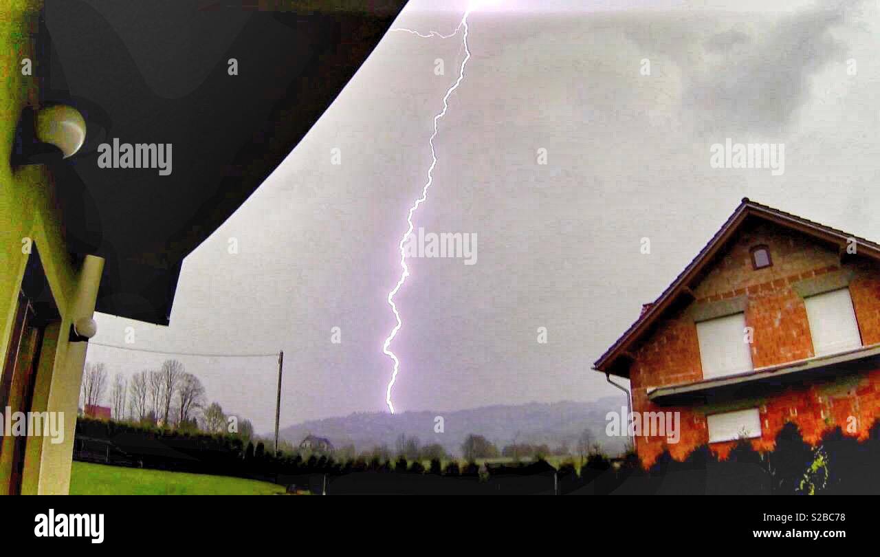 Lightning bolt during a summer storm Stock Photo - Alamy