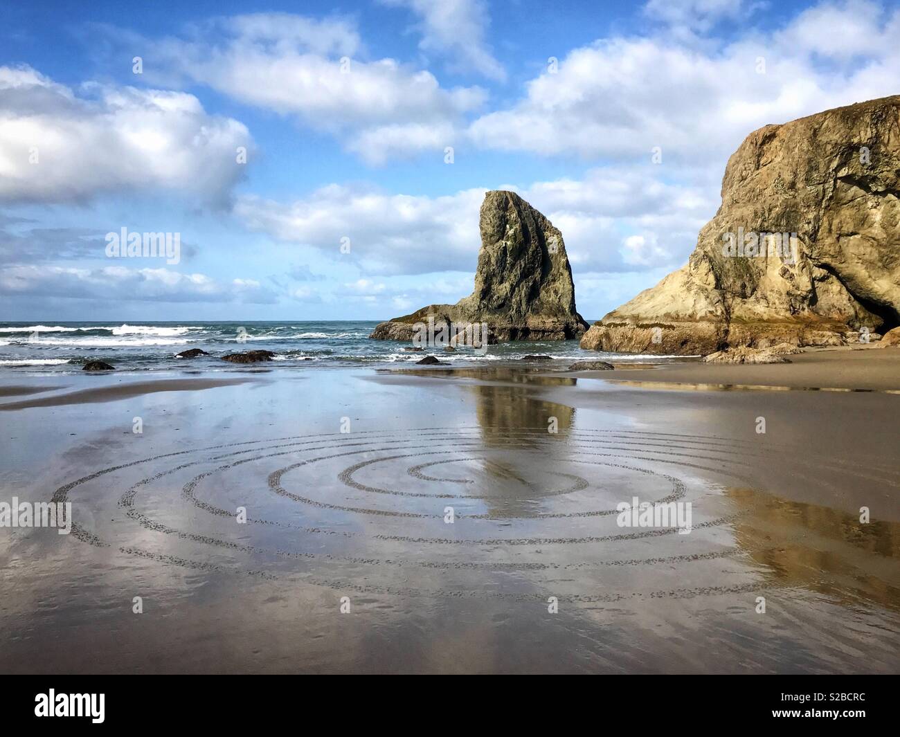 Labyrinth being washed away by high tide at Face Rock State Park ...