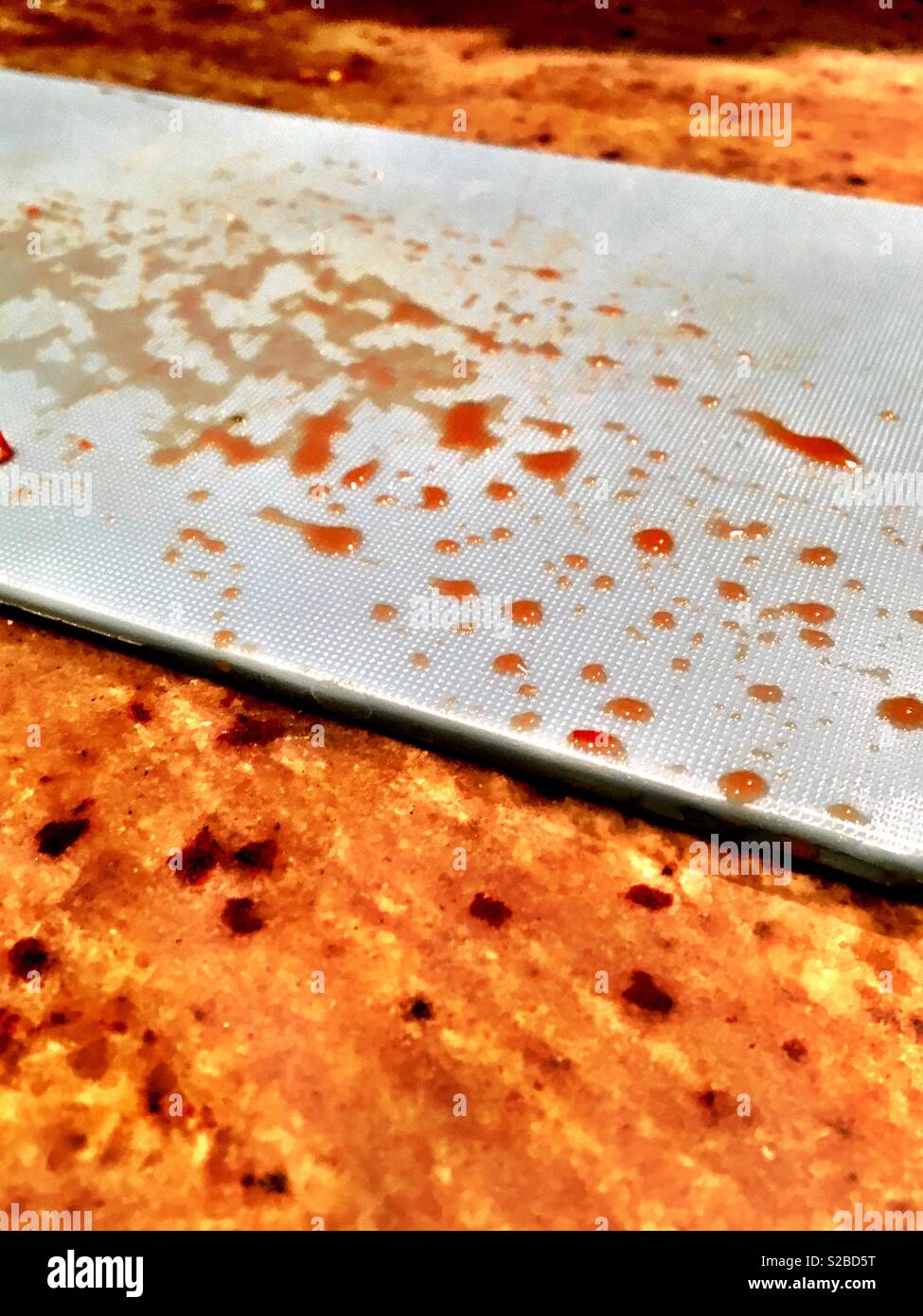Bloody chopping board Stock Photo - Alamy