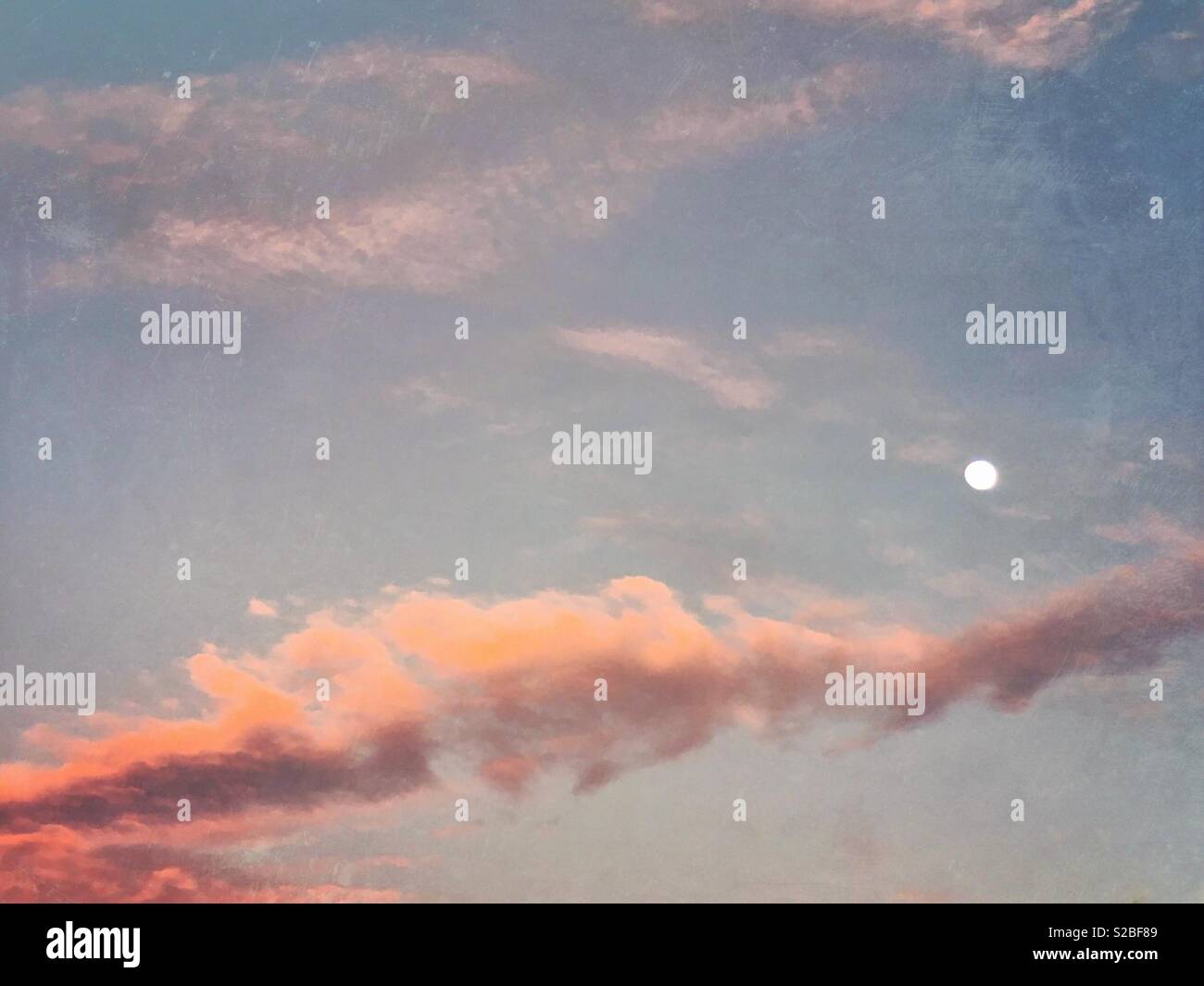 Clouds and moon at sunset hi-res stock photography and images - Alamy