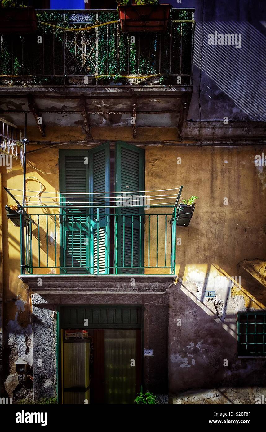 Sunlight slanting across a balcony Stock Photo - Alamy