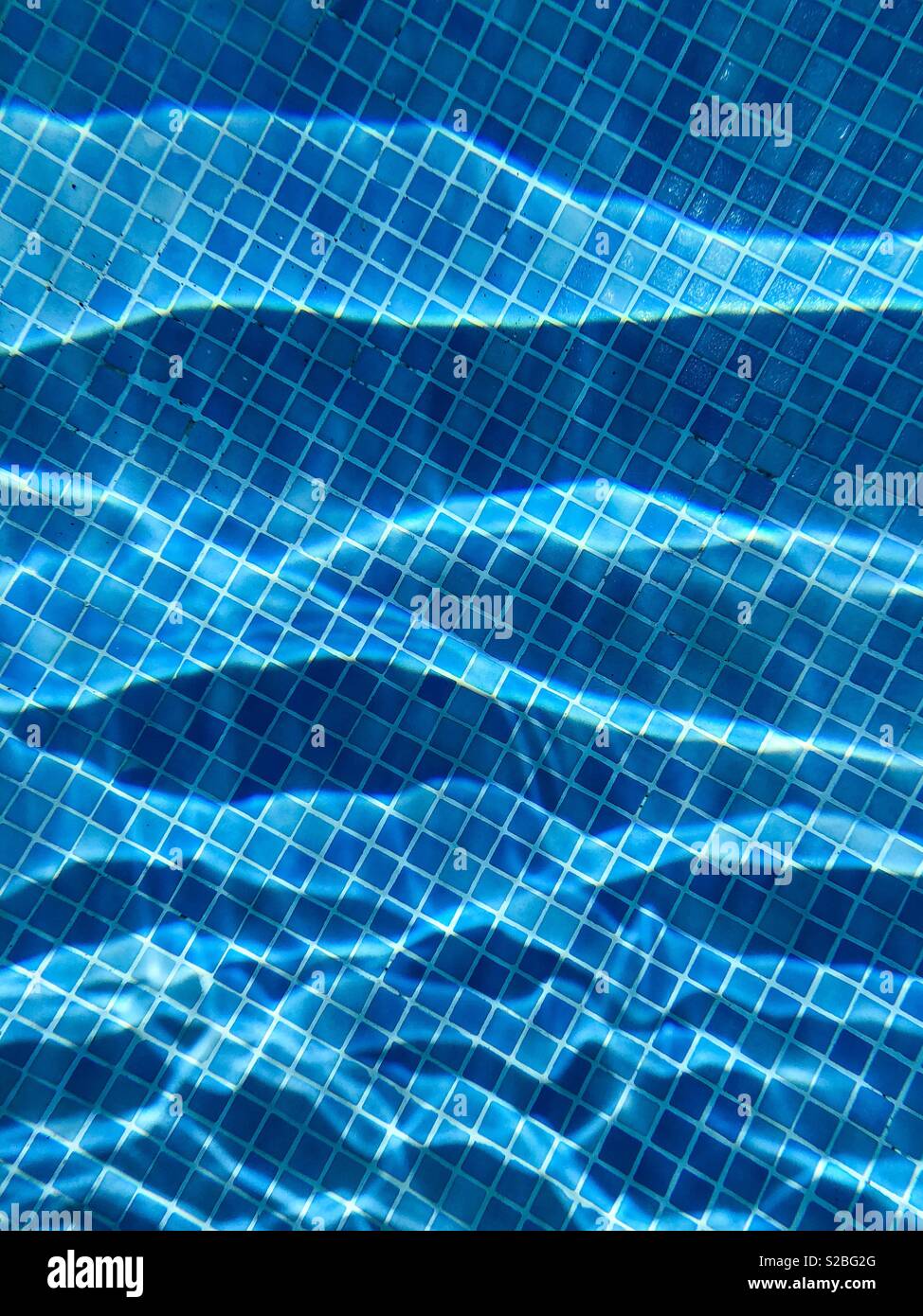 Swimming pool water Stock Photo - Alamy