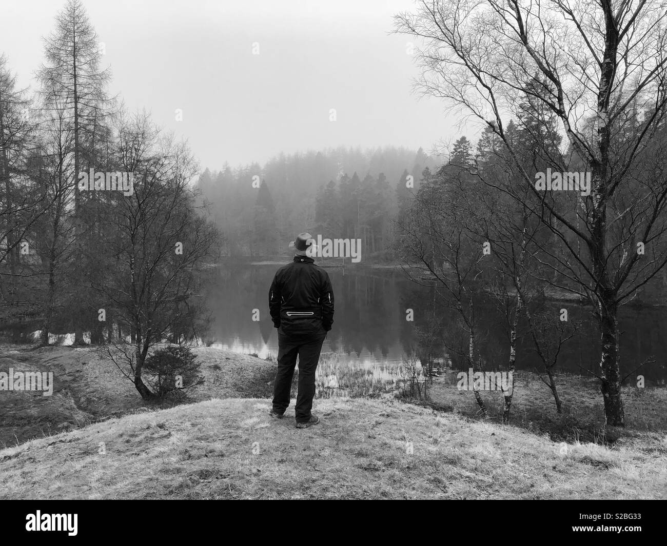Lone man in the wilderness Stock Photo - Alamy