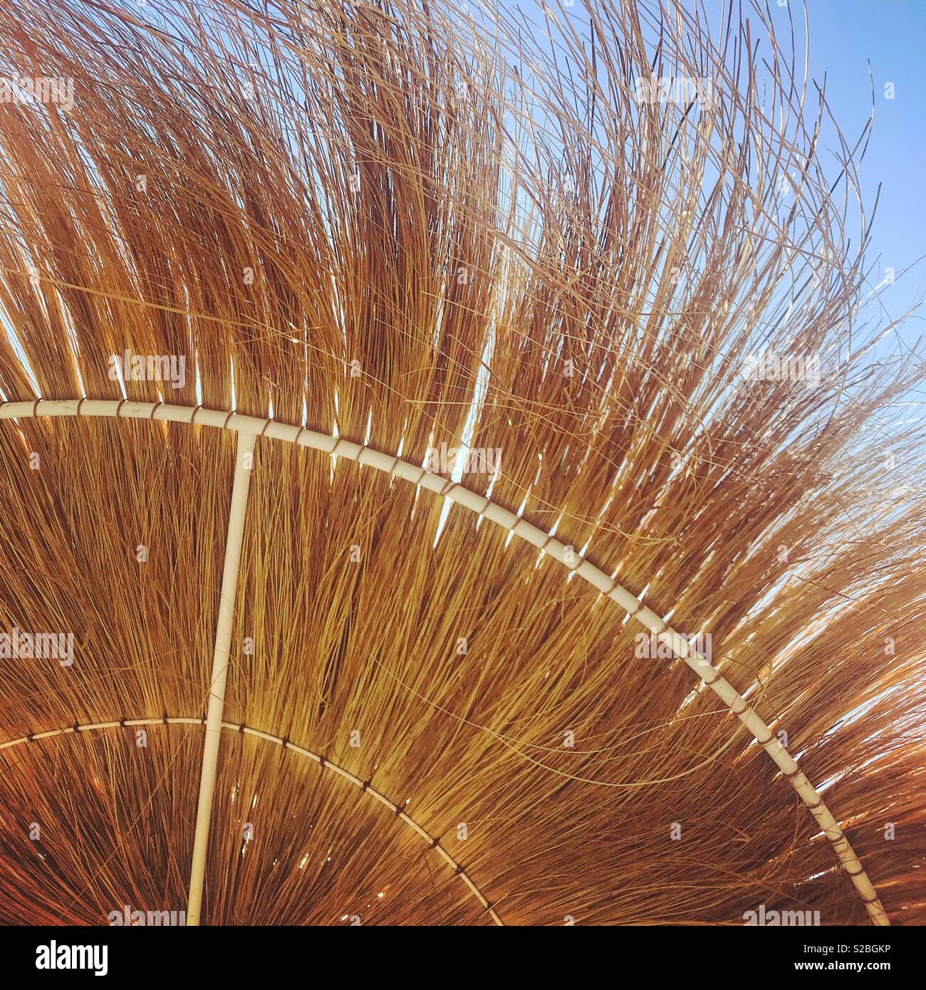 Golden Thatch beach umbrella worm’s eye view in Tenerife, Spain Stock ...