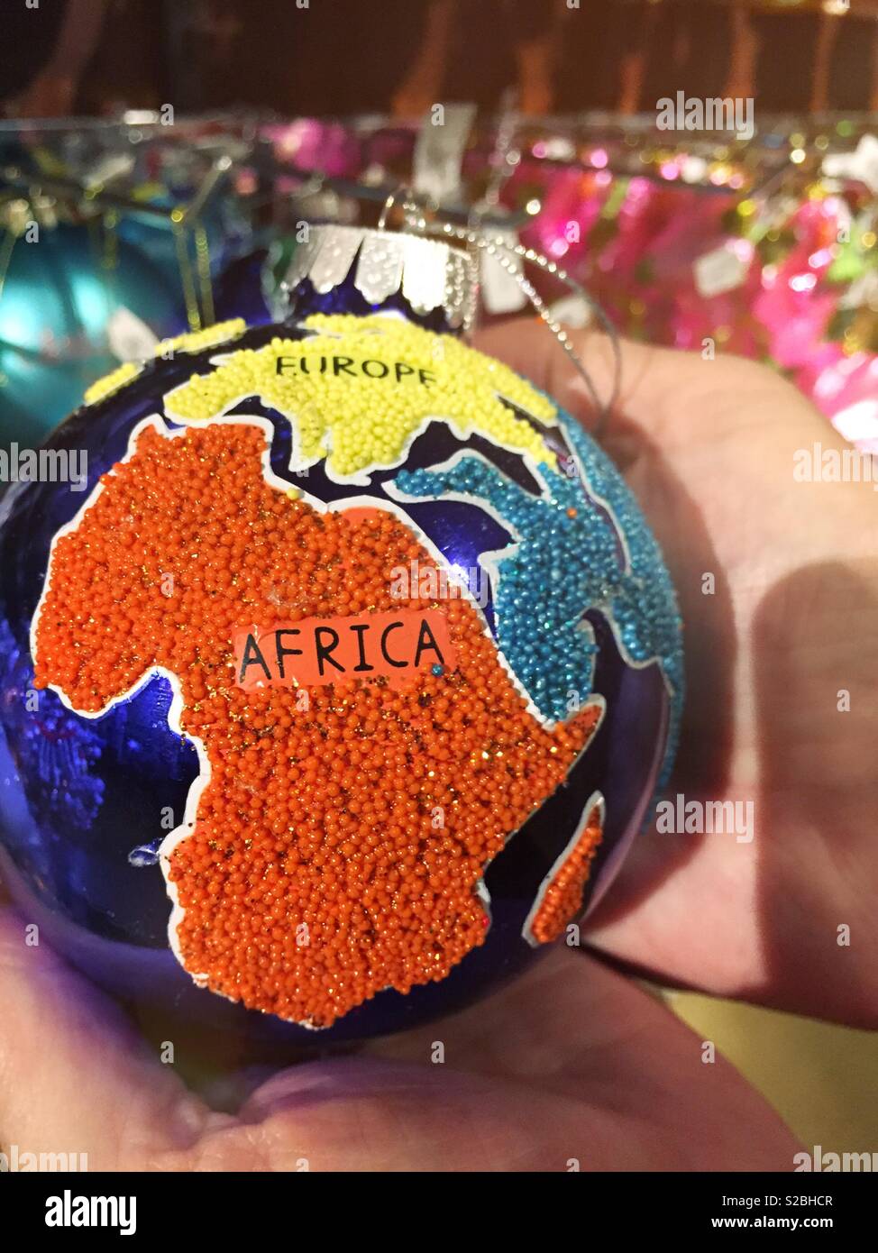 Christmas ornament with a map of the world, USAA Stock Photo - Alamy