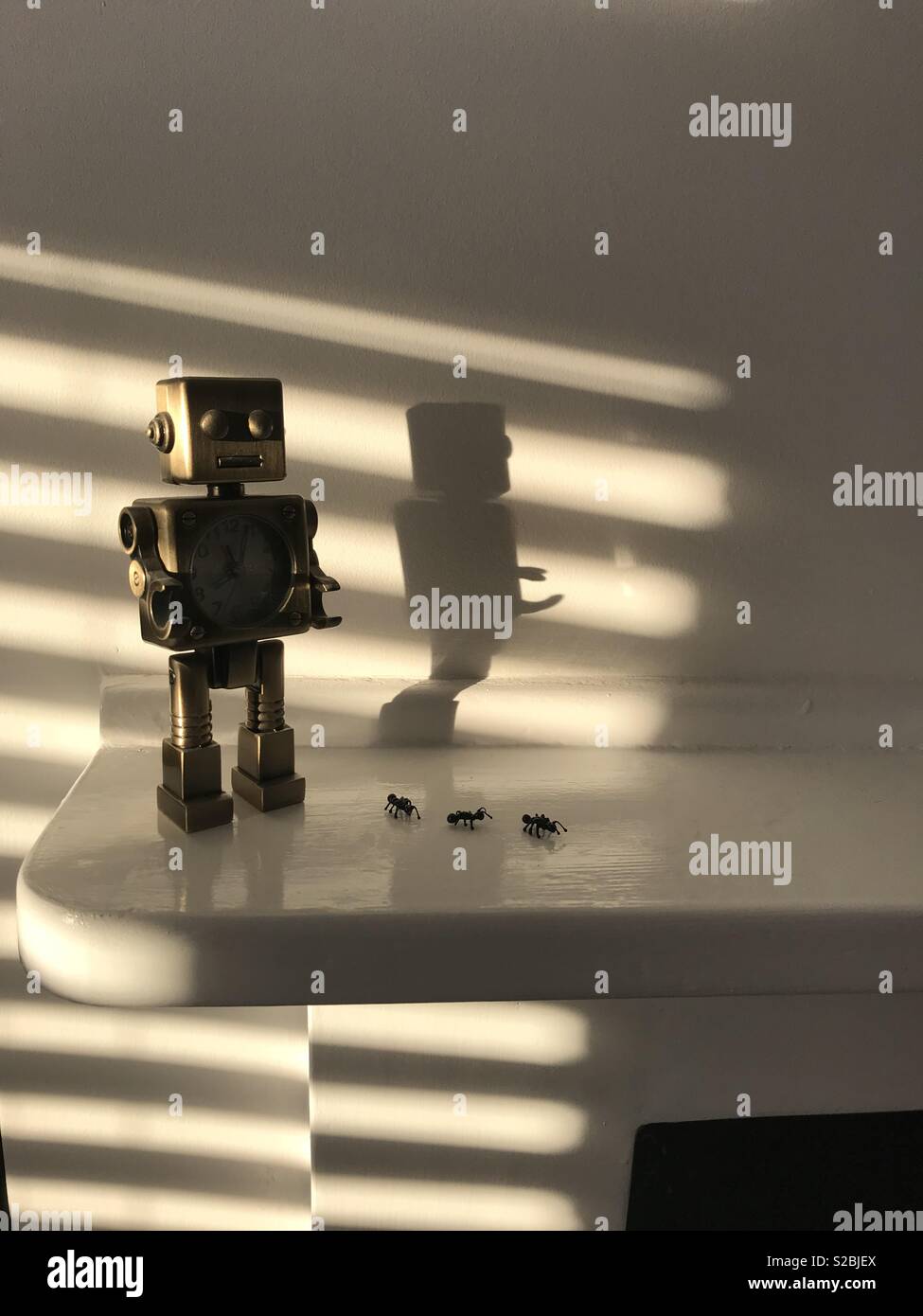 Robot on ledge with ants Stock Photo - Alamy