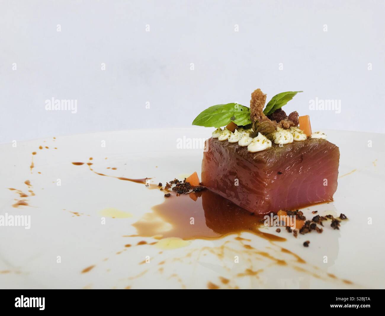 Salt-sugar cured tuna•veal juice•capers mayonnaise Stock Photo - Alamy