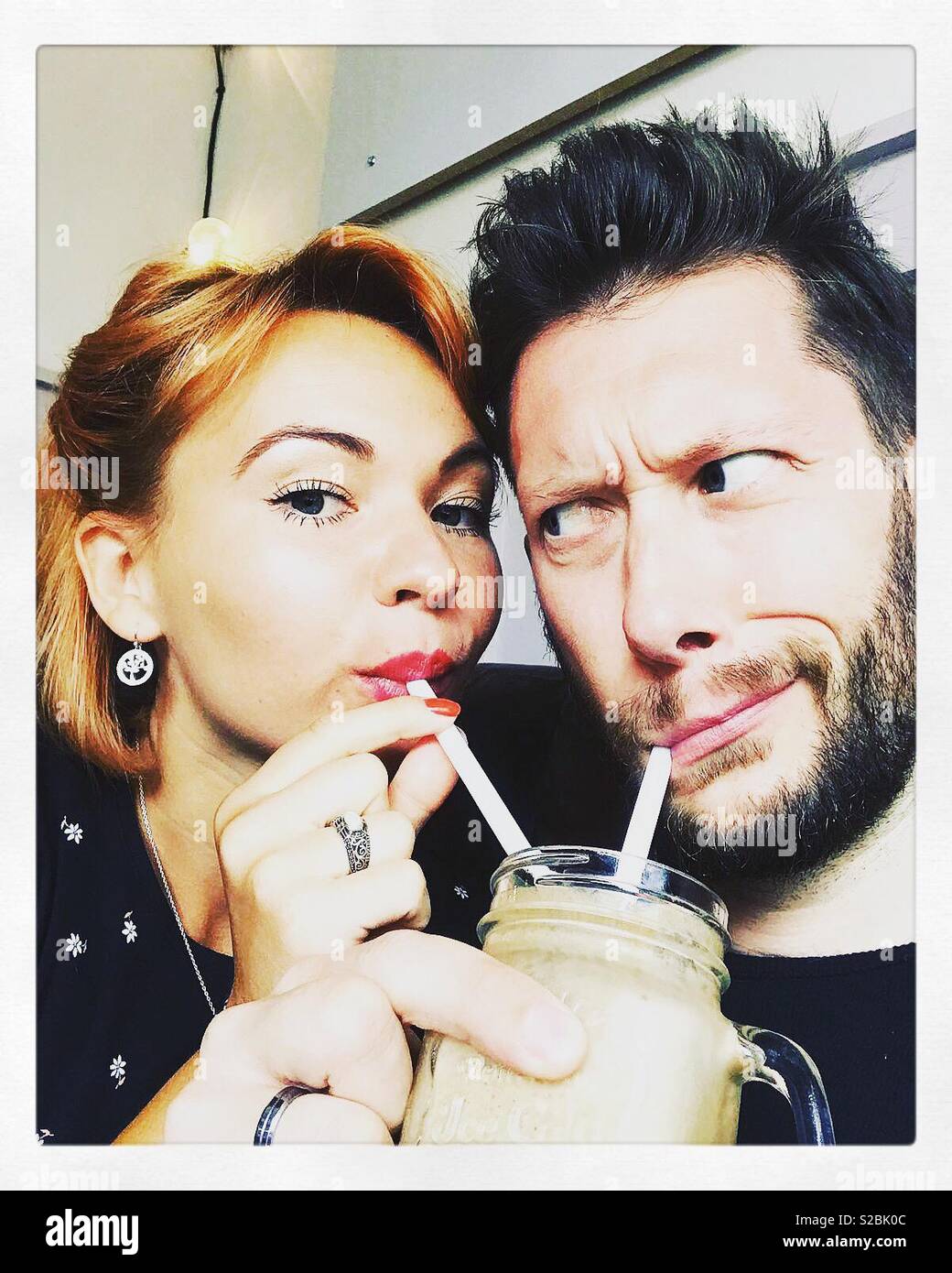 Sharing is caring, couples day out, lunch Stock Photo - Alamy