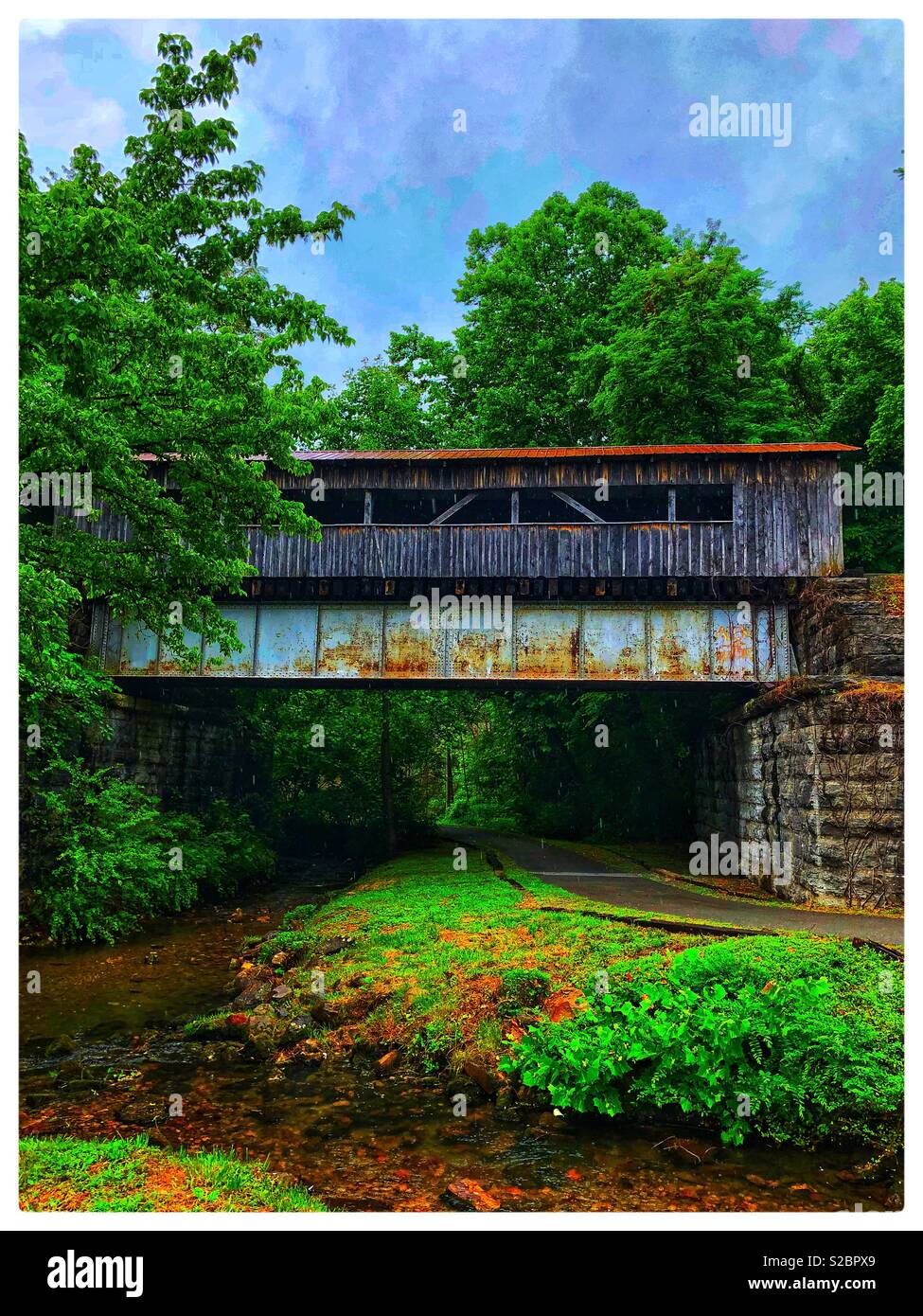 Covered train bridge Stock Photo - Alamy