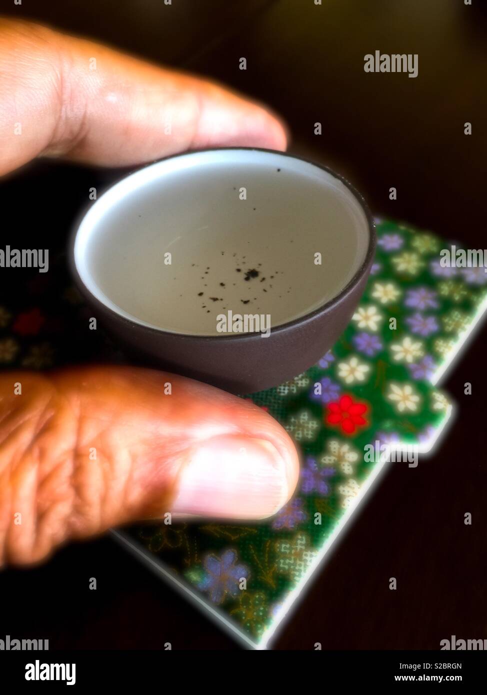 Tiny tea cup Stock Photo - Alamy