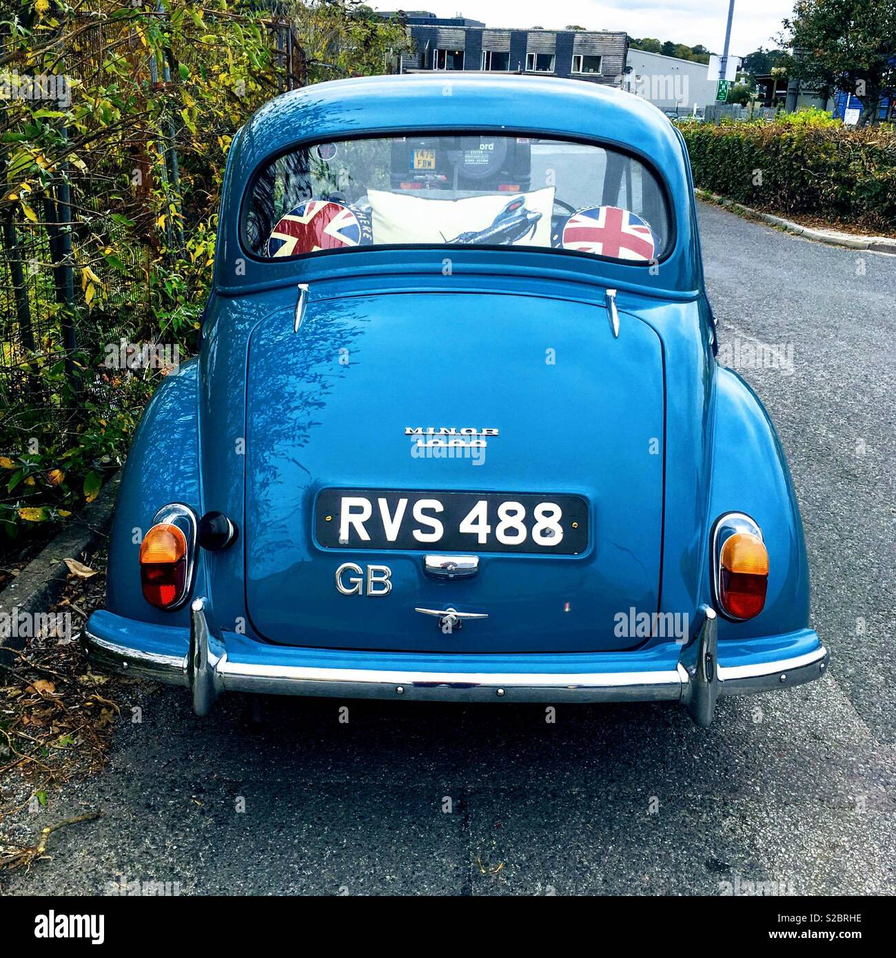 Back view of a Morris minor 1000 with Union Jack cushions in the rear ...