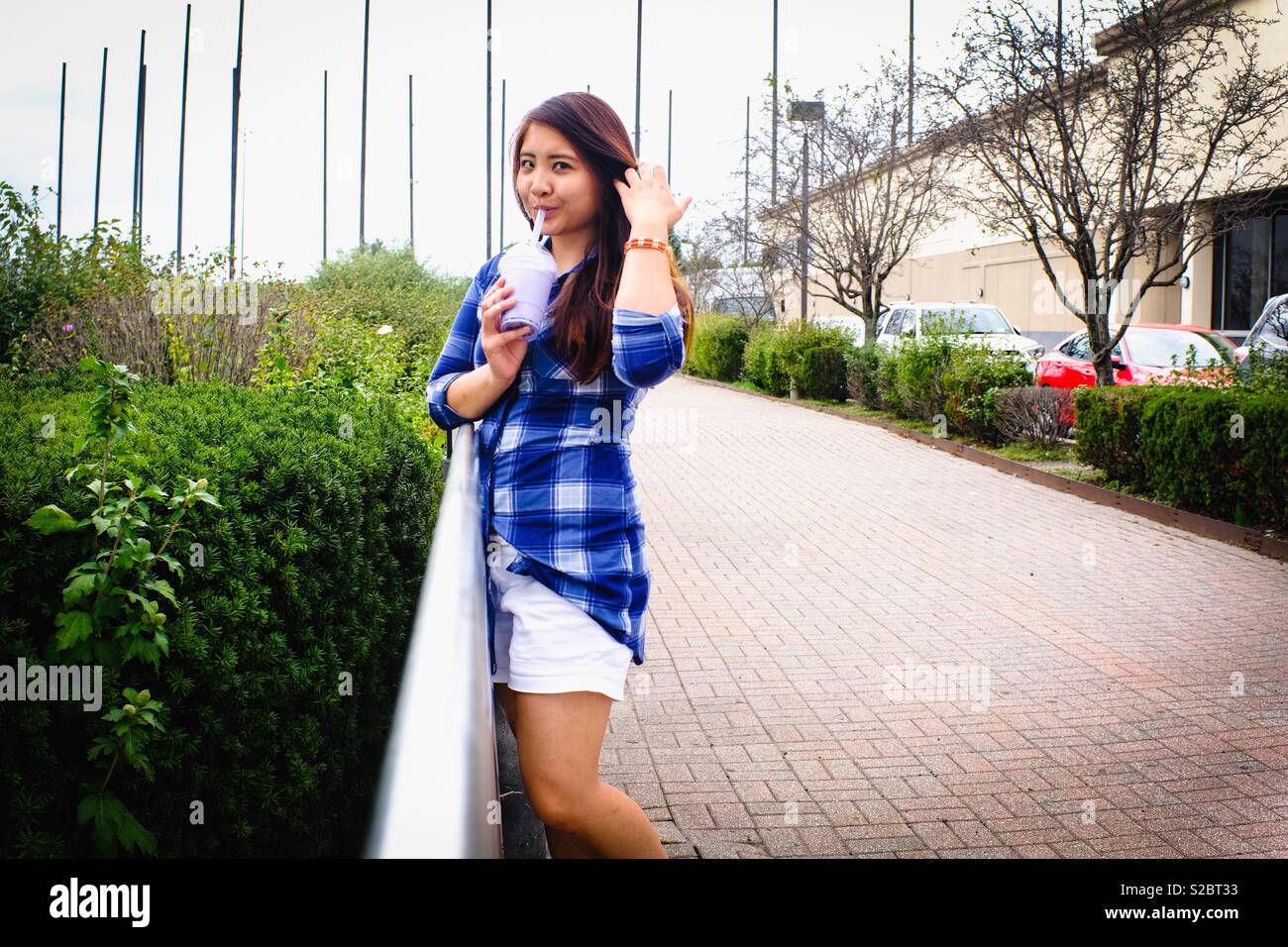 Woman sipping tea hi-res stock photography and images - Alamy