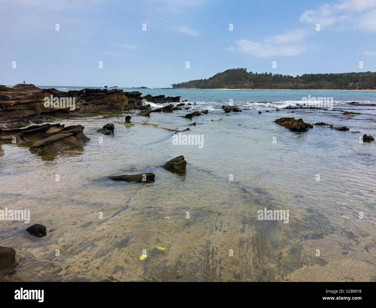 Karang Taraje Beach Stock Photo - Alamy